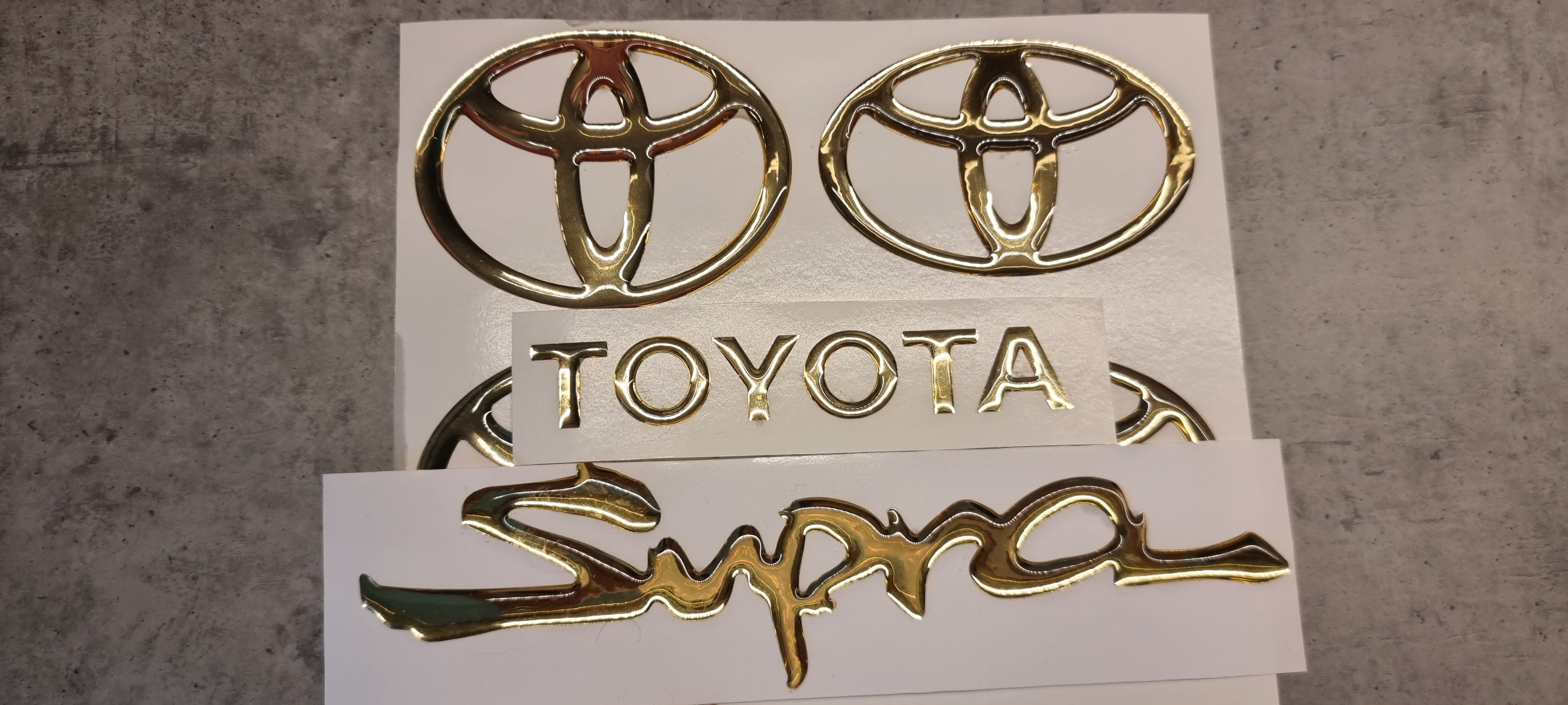 JZA80 Supra Gold Emblems – Supra Part Import
